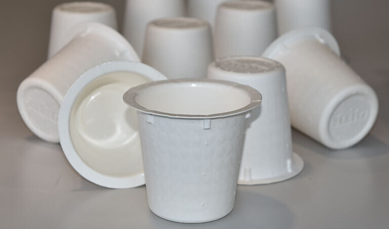Pulp laminated dairy cups
